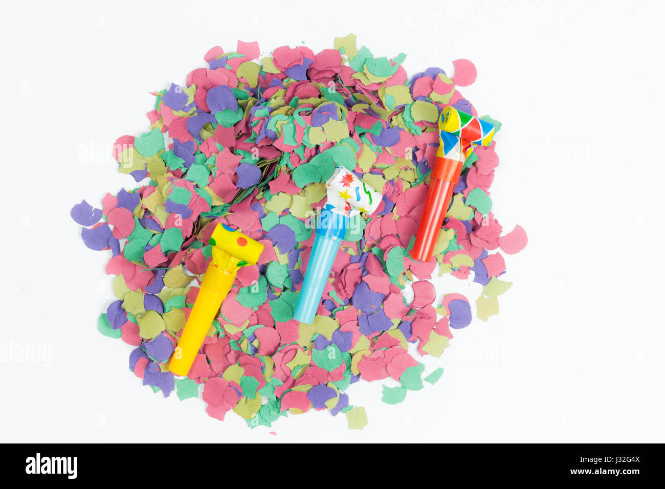 confetti and party blower on white background Stock Photo - Alamy