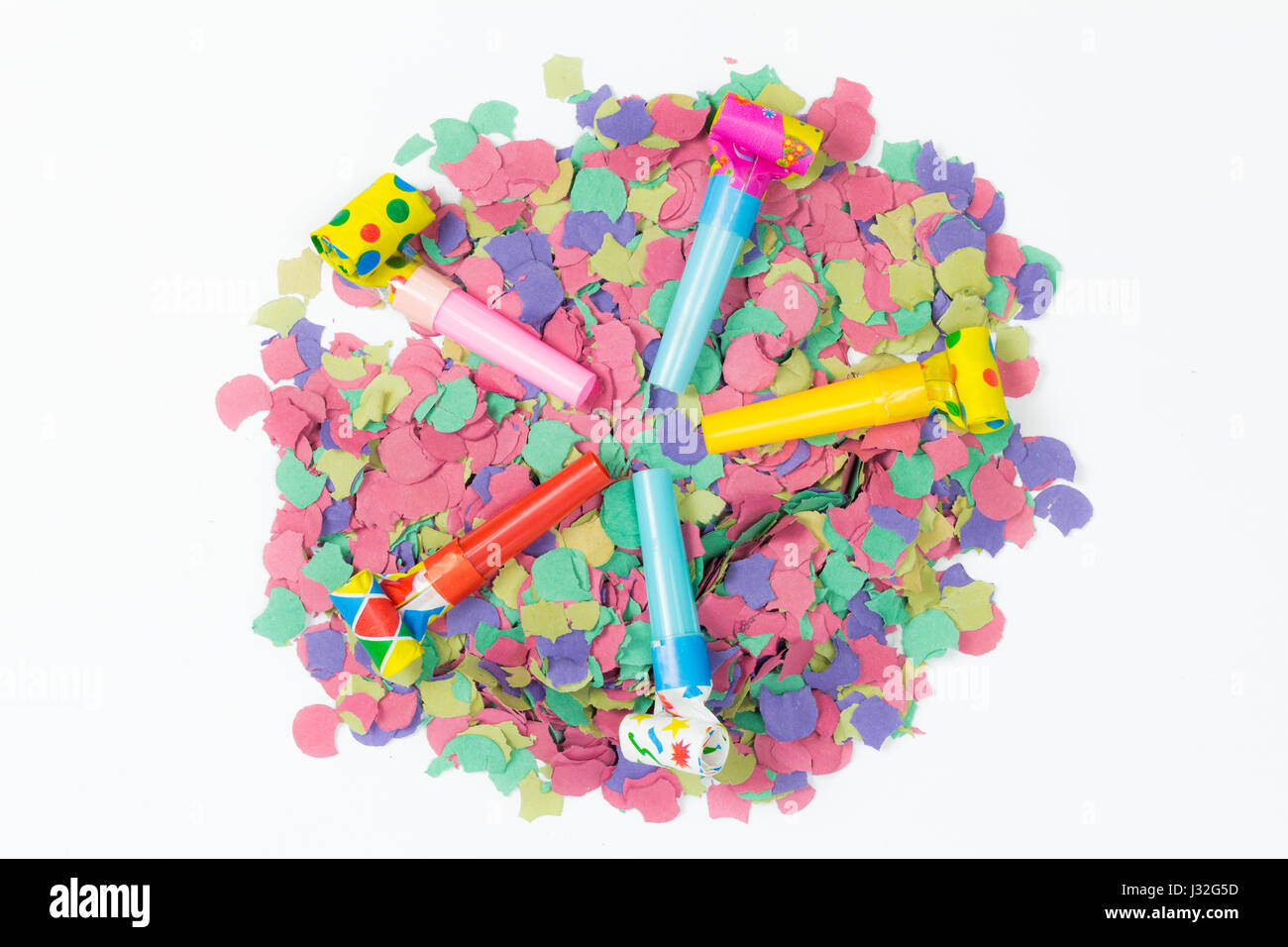 confetti and party blower on white background Stock Photo - Alamy