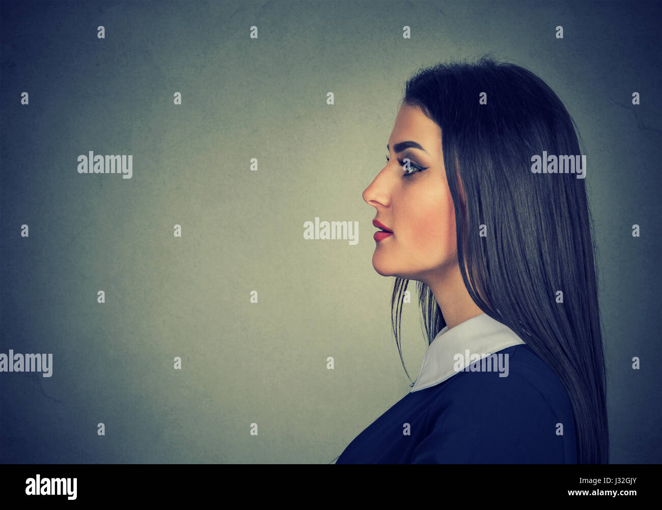 Side profile portrait of a young woman Stock Photo - Alamy