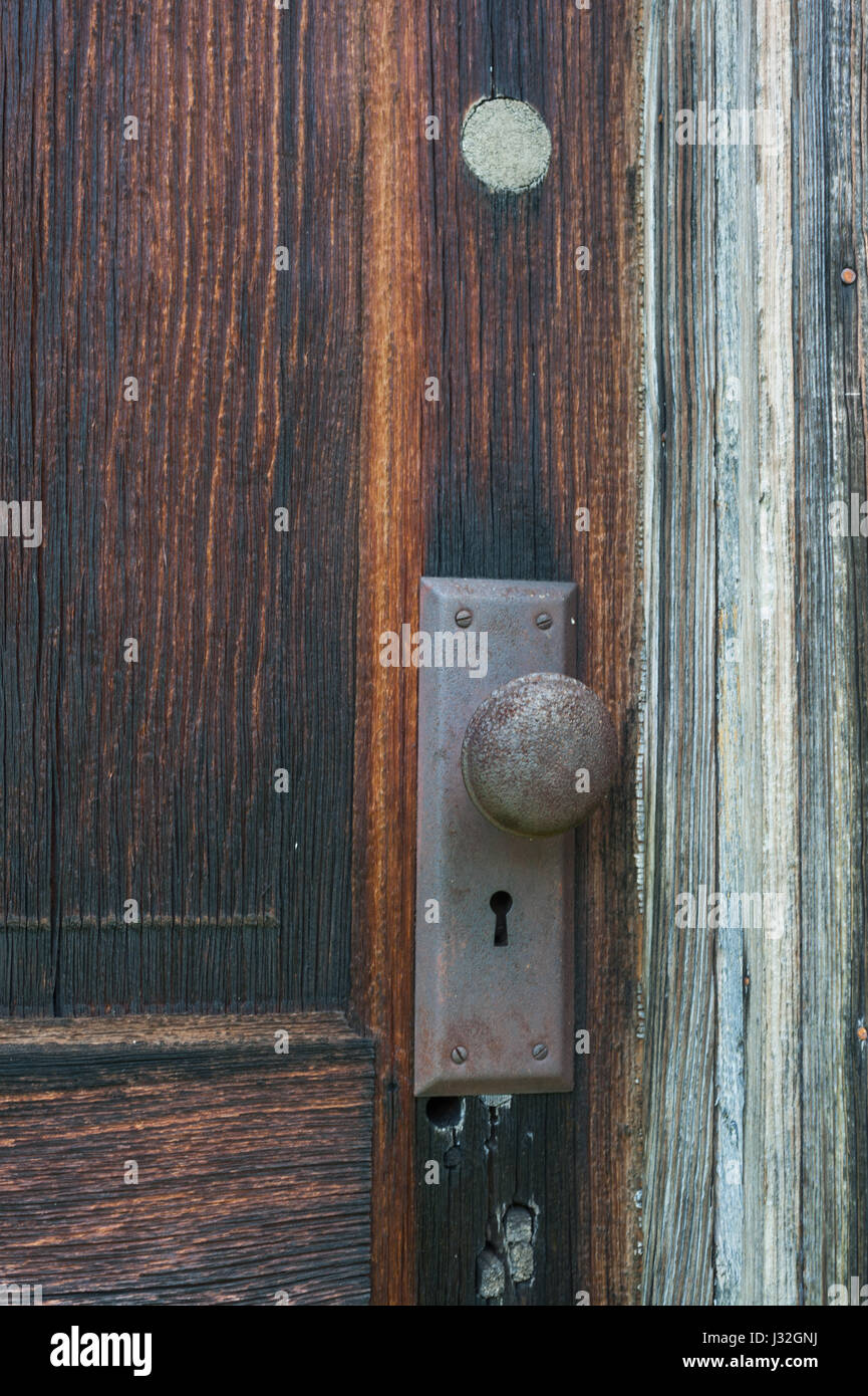 Old door with rusty door knob Stock Photo - Alamy