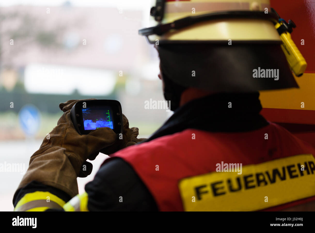 German firefighter in a action with a thermal imaging camera Stock ...