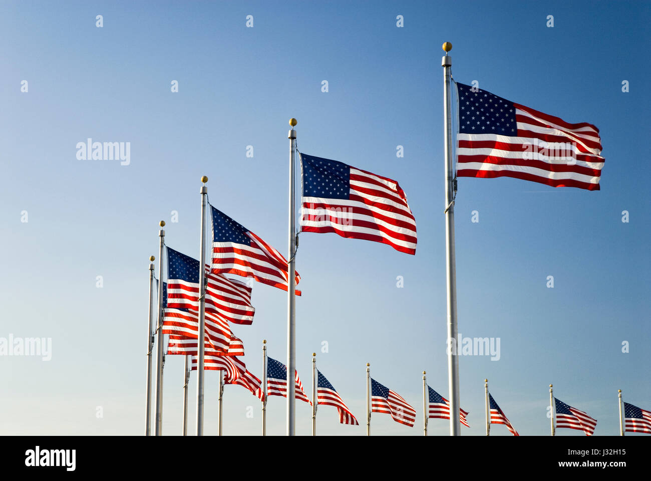Flags surround the Washington Monument on the national mall in ...