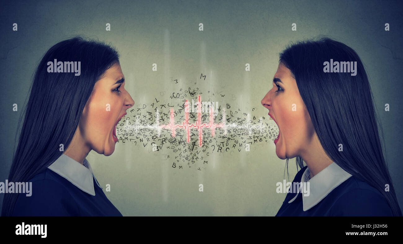 Two women screaming at each other Stock Photo - Alamy