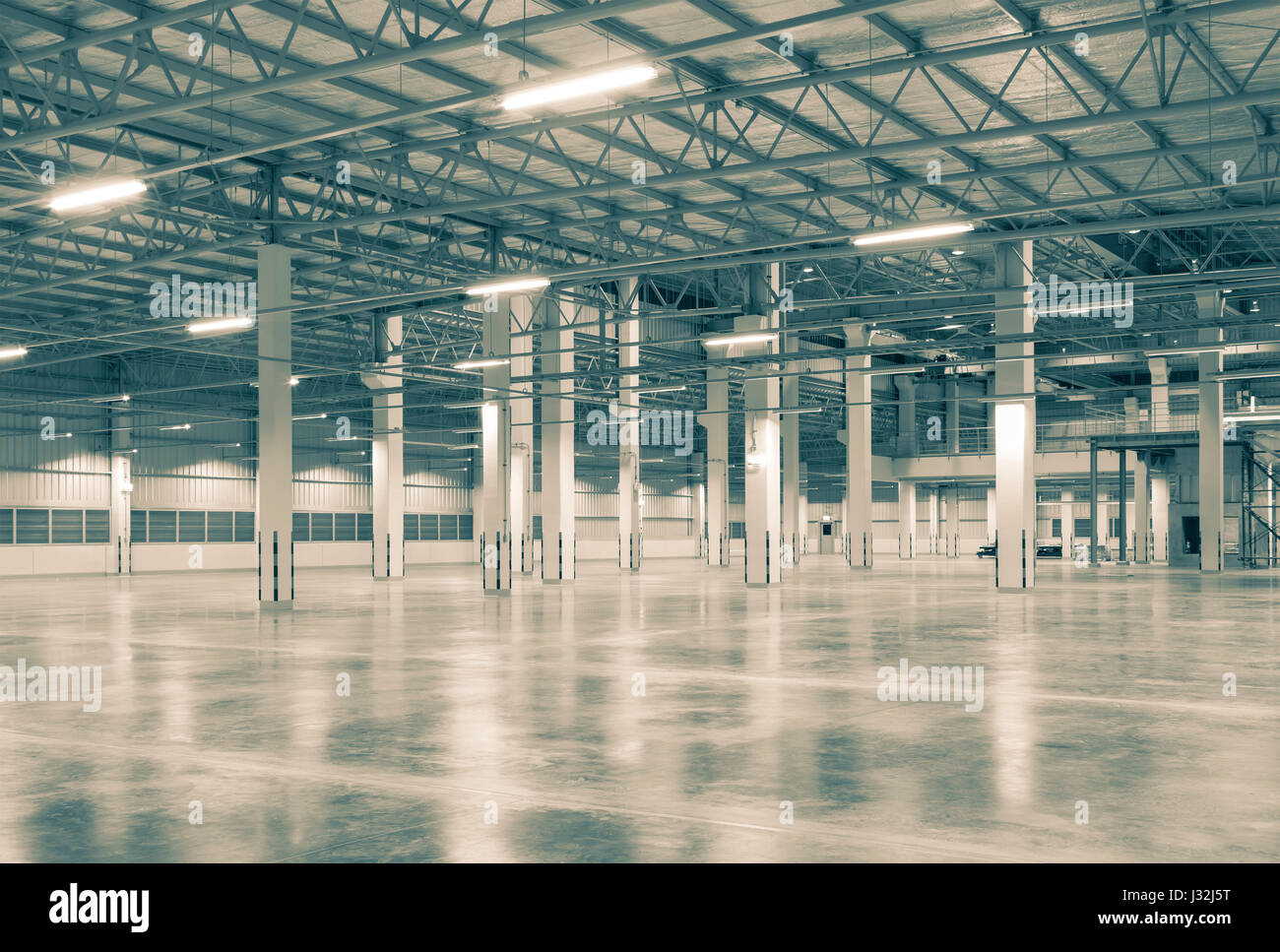 Empty factory building or warehouse building with concrete floor for ...