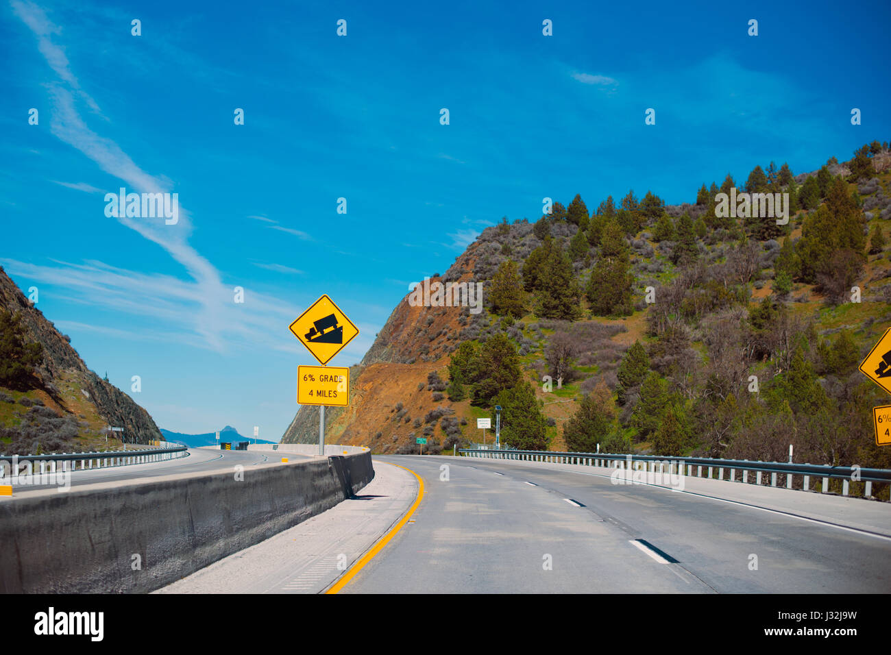 Downhill road sign hi-res stock photography and images - Alamy