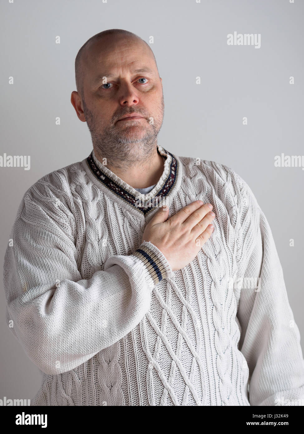 Right hand over heart hi-res stock photography and images - Alamy