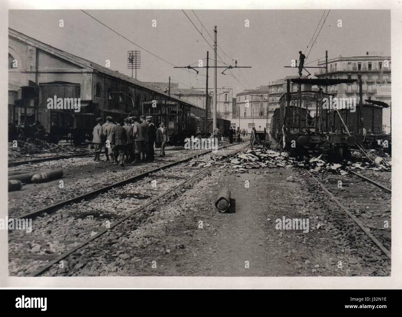 Napoli 1943, featuring the Stazione Centrale in Naples, captures the ...
