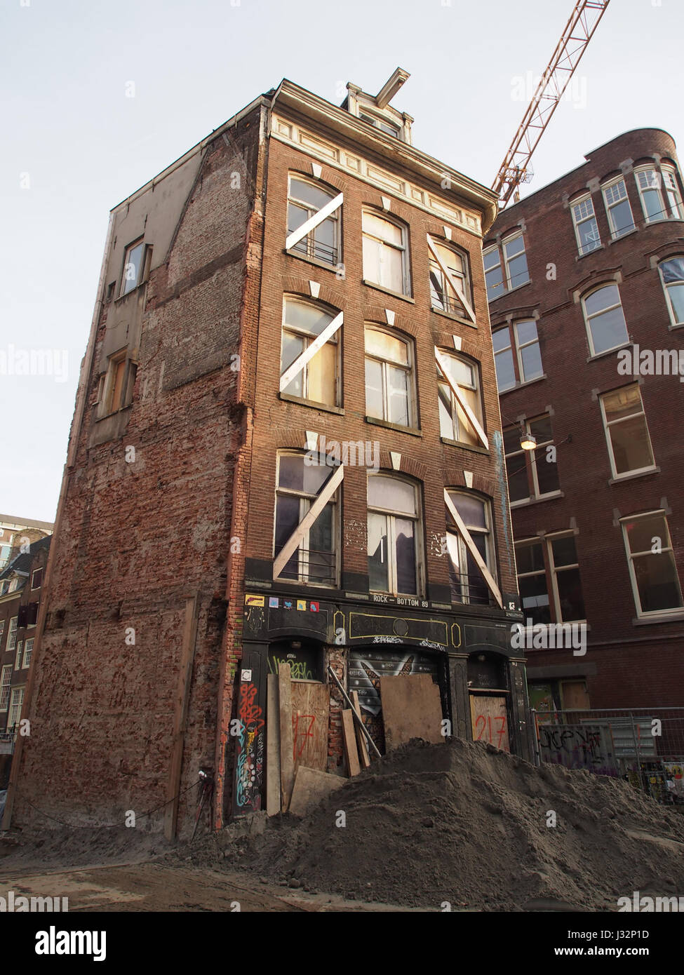 This photograph captures the intersection of Spuistraat and Wijdesteeg ...