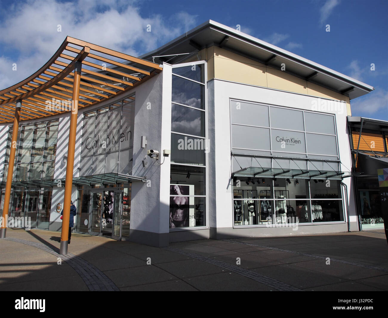 A photograph showcasing a Calvin Klein store at the Outlet Center ...