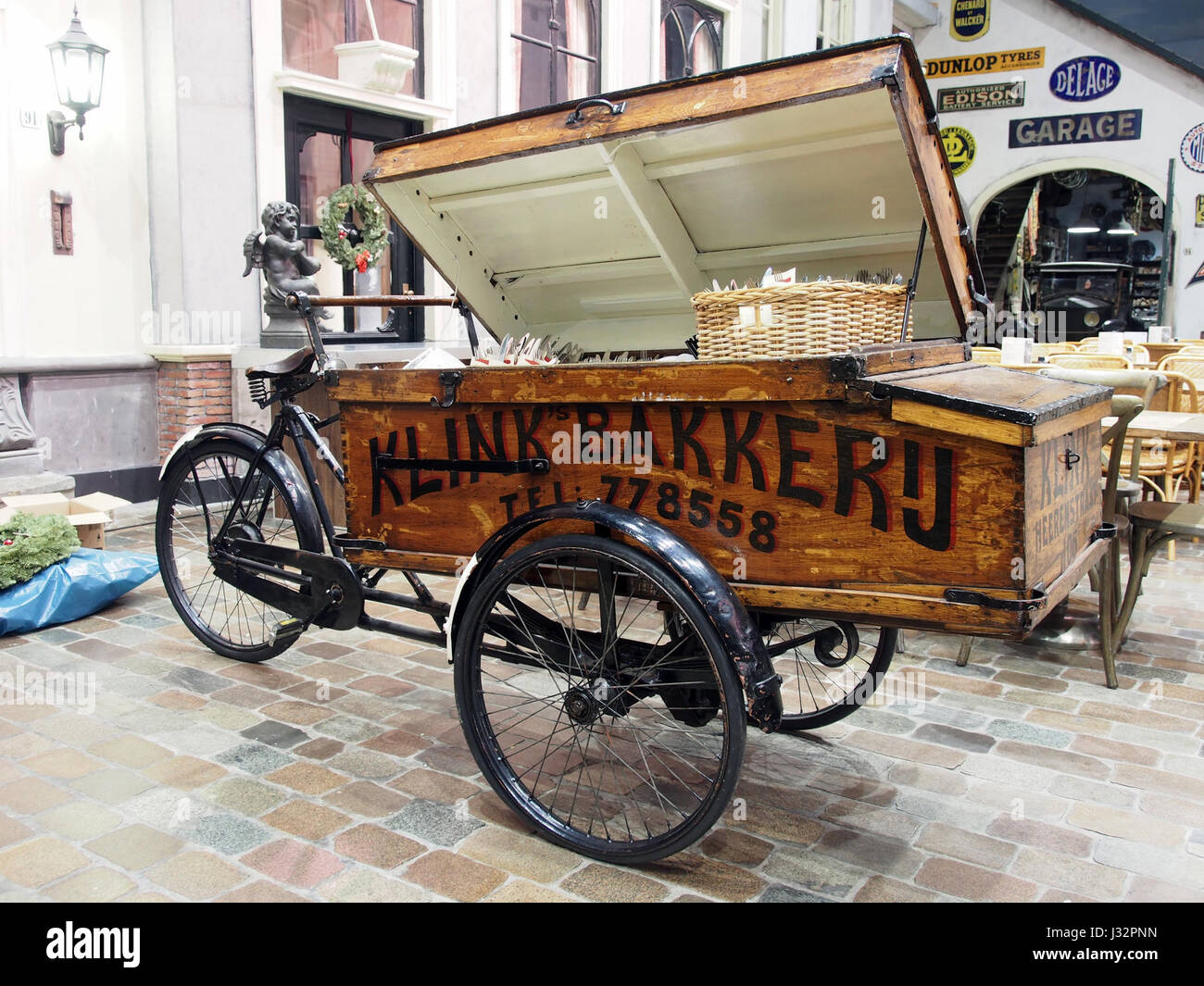 A Bakfiets, a Dutch cargo bicycle, on display at the Louwman Museum in ...
