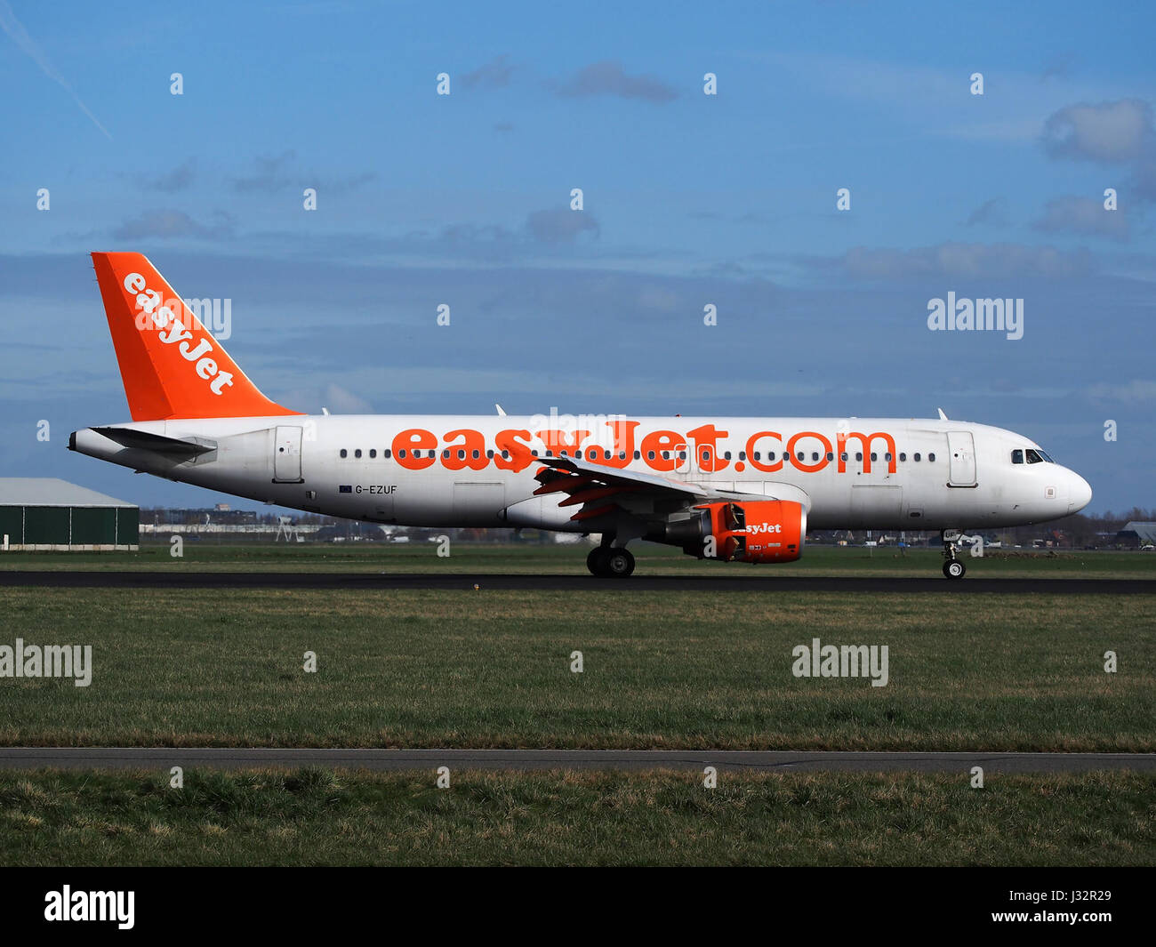 The Airbus A320-214, registered G-EZUF, operated by easyJet, is ...