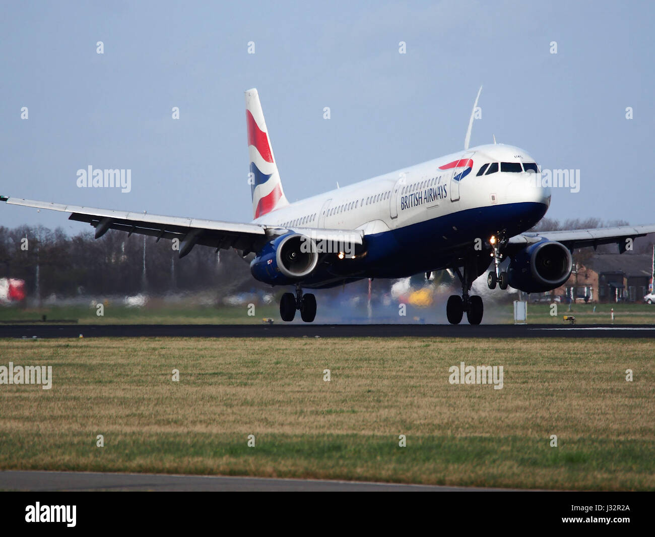 This image features a British Airways Airbus A321-231, registration G ...