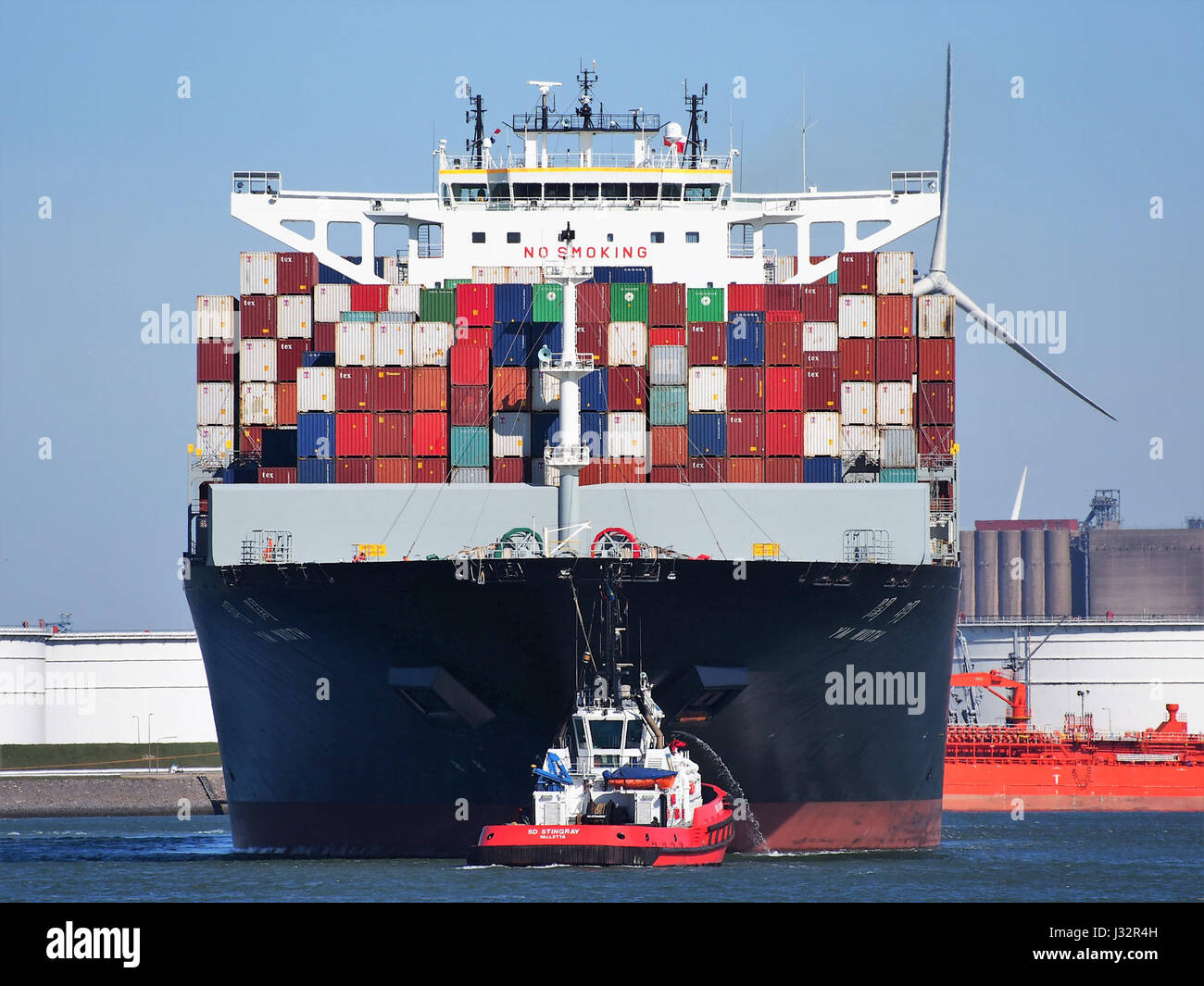 The YM Width, a container ship with IMO number 9708447, arrives at the Port of Rotterdam in 2016 ...