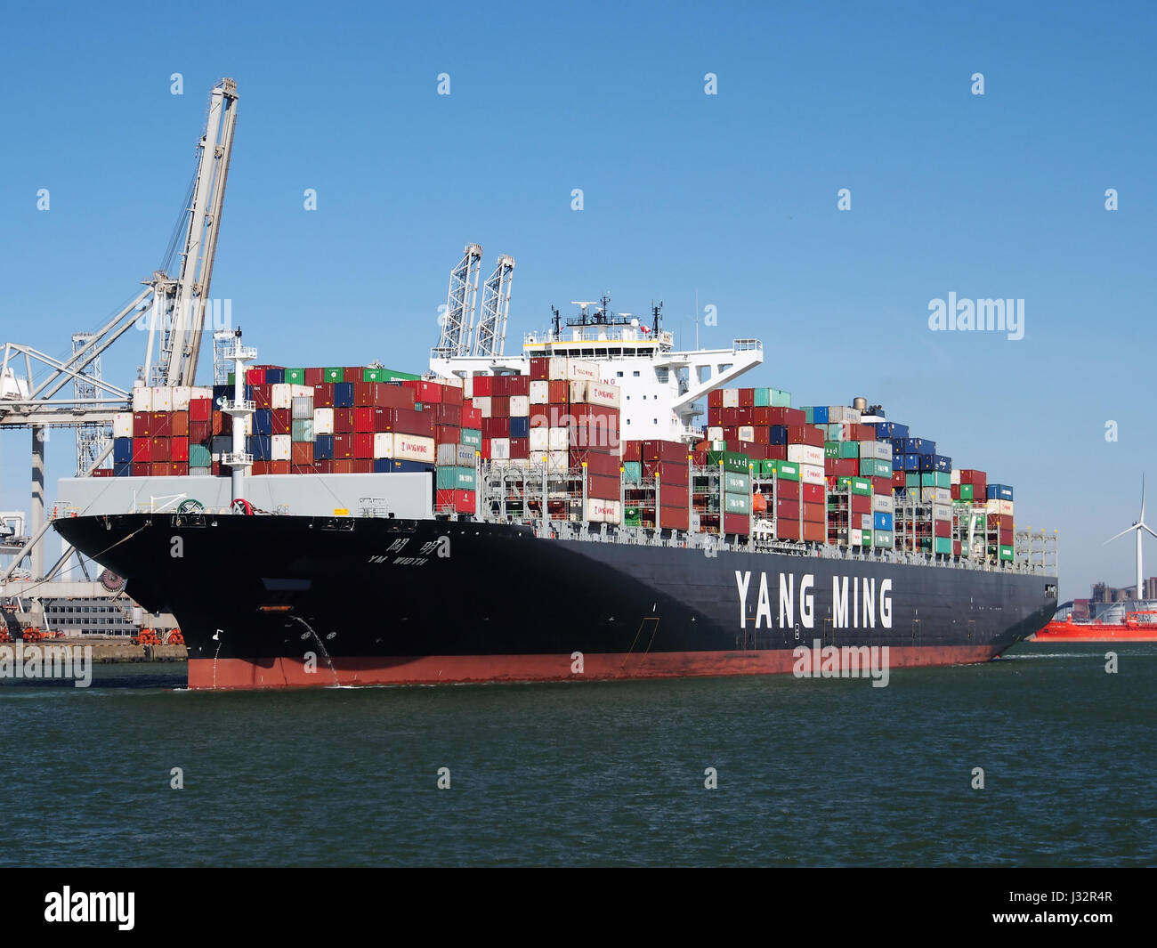 The YM Width, a cargo ship registered under IMO number 9708447, is ...