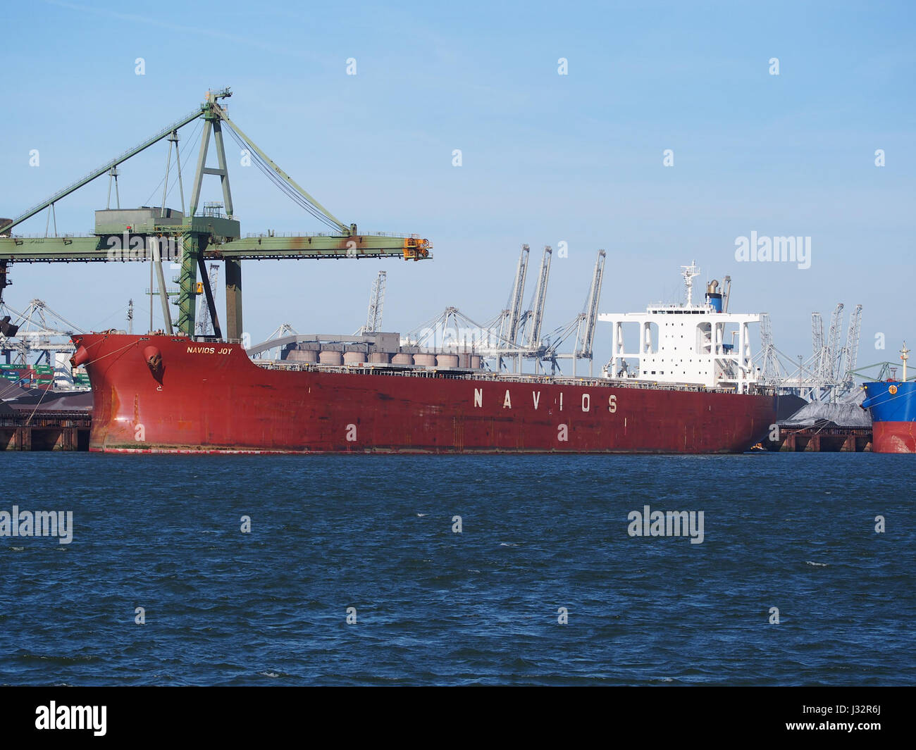 An image of the *Navios Joy*, a bulk carrier ship, taken at the Port of ...