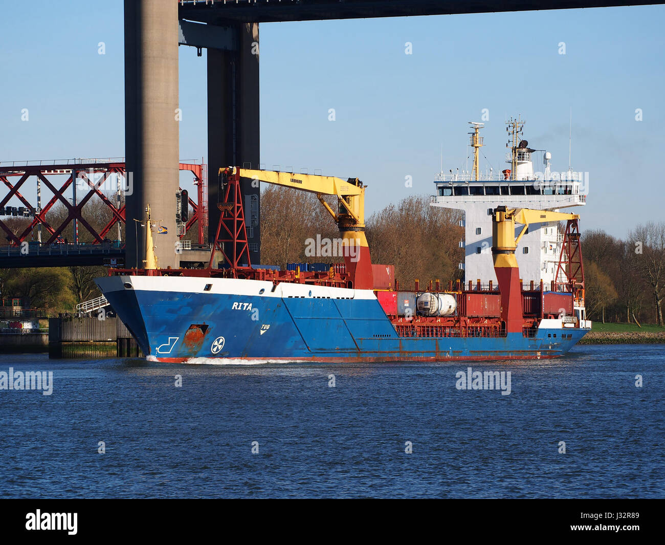 A photograph of the ship 'Rita' (IMO 9318931) passing under the ...