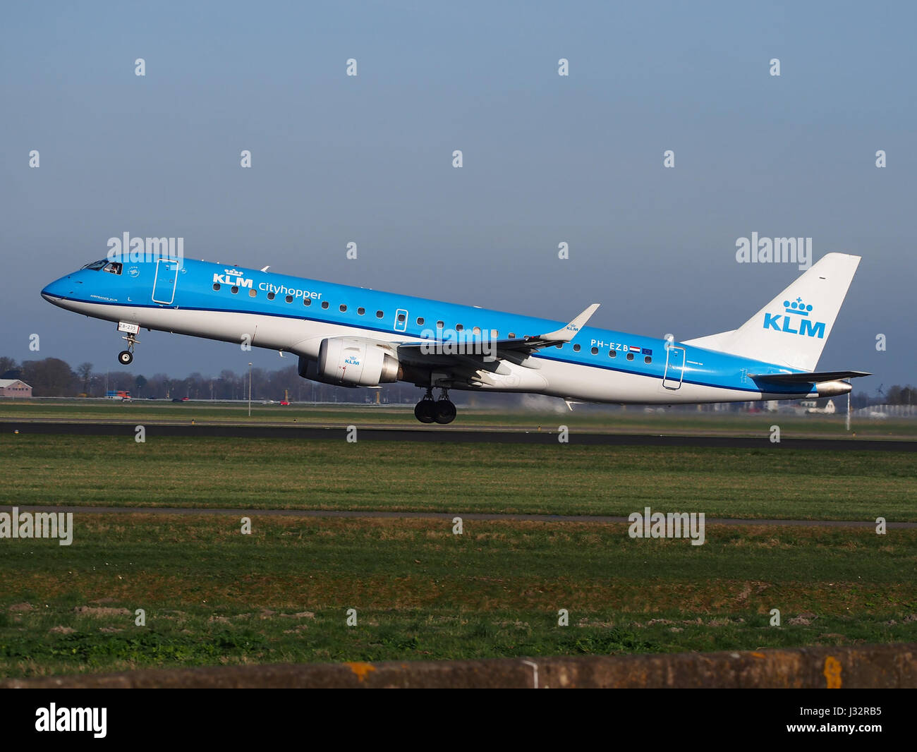 The image shows KLM Cityhopper's Embraer ERJ-190STD aircraft ...