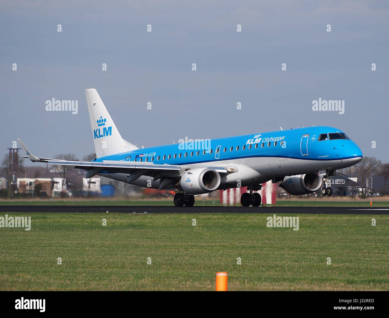 The PH-EZB, an Embraer ERJ-190STD aircraft, is landing at Schiphol ...