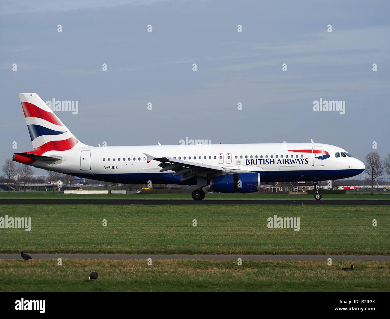 The image shows the G-EUUS British Airways Airbus A320-232 at Schiphol ...