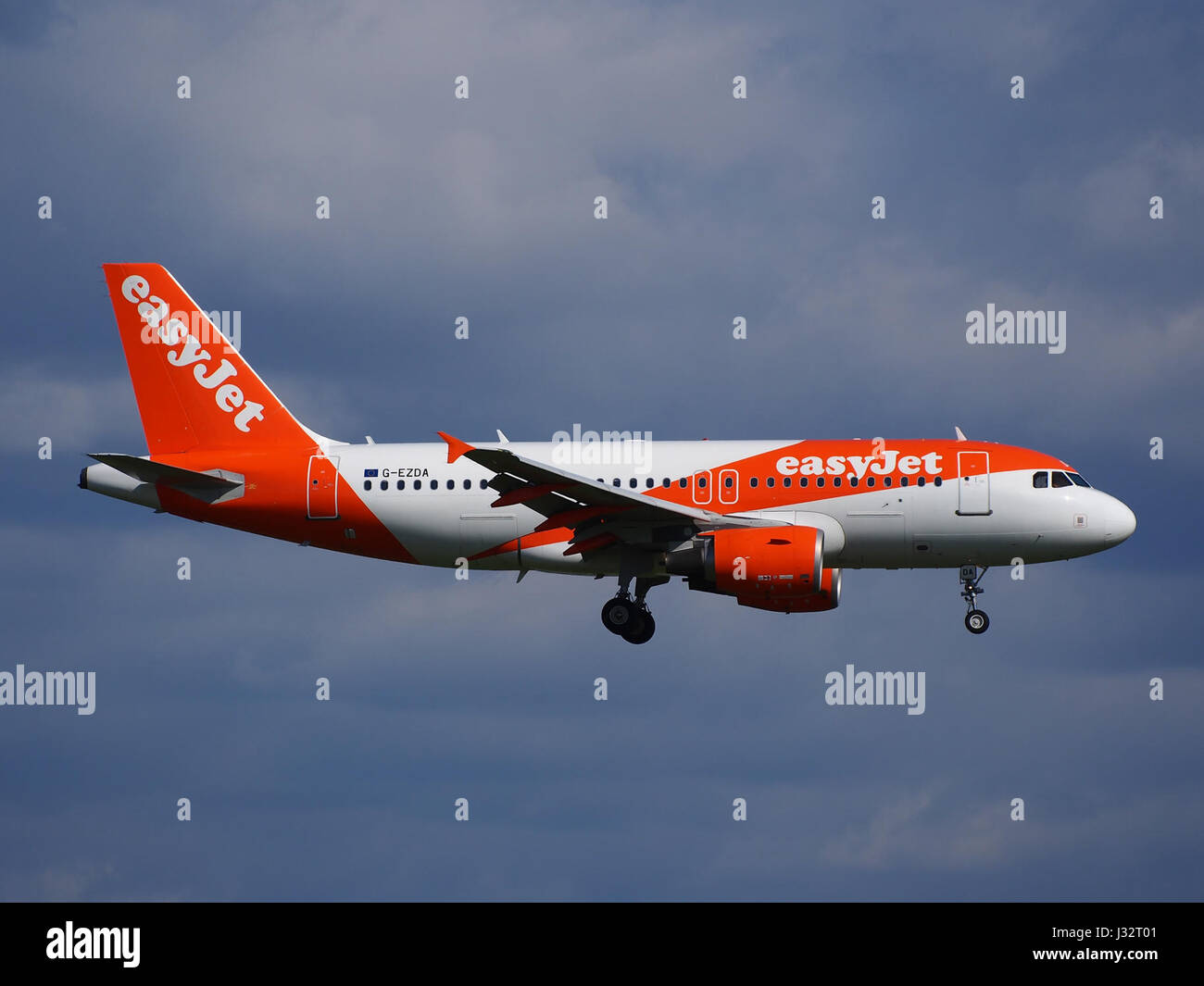 An easyJet Airbus A319-111, registration G-EZDA, parked at Schiphol ...