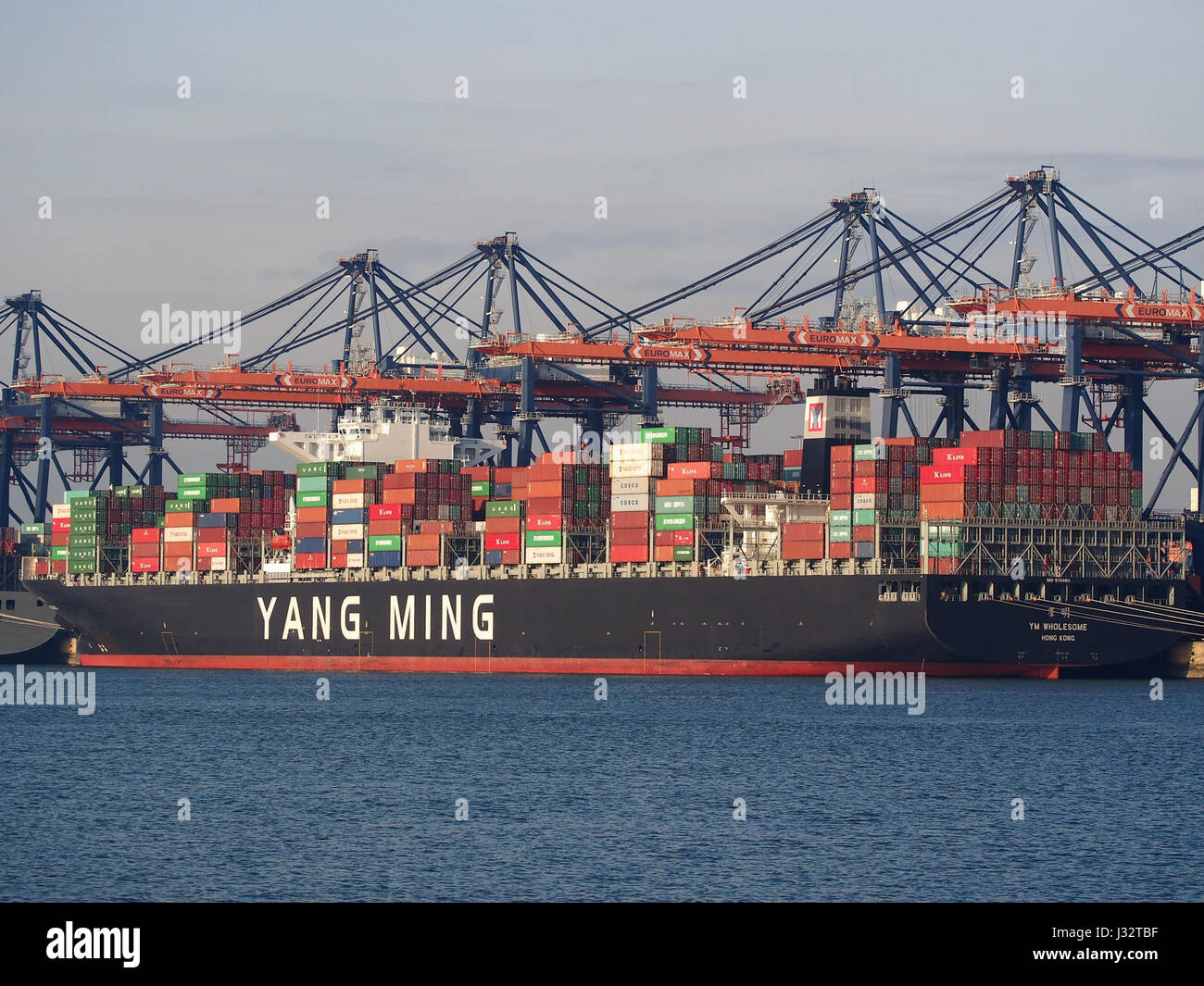 The YM Wholesome, a container ship built in 2015, is captured at the ...