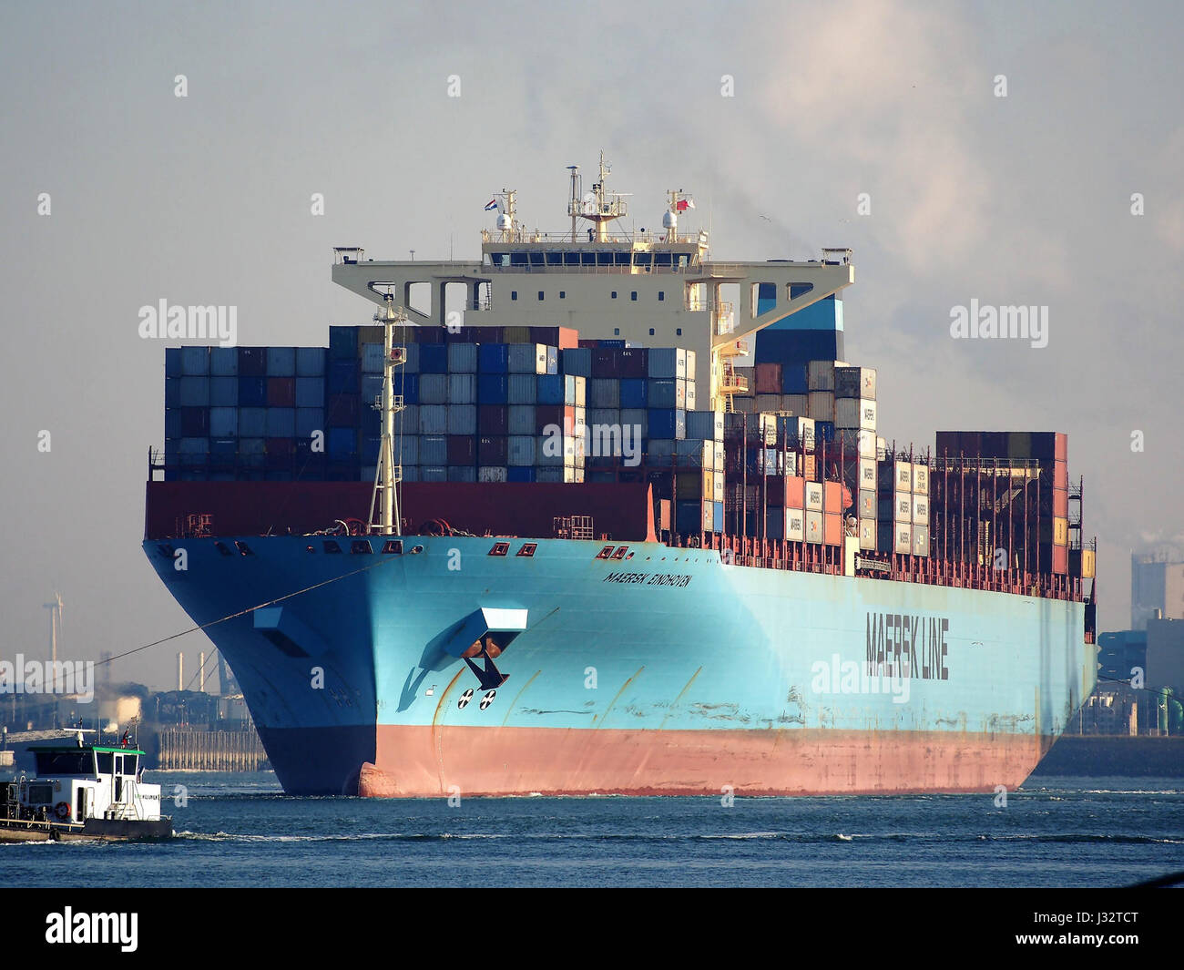 A photograph showing the Maersk Eindhoven, a container ship built in ...