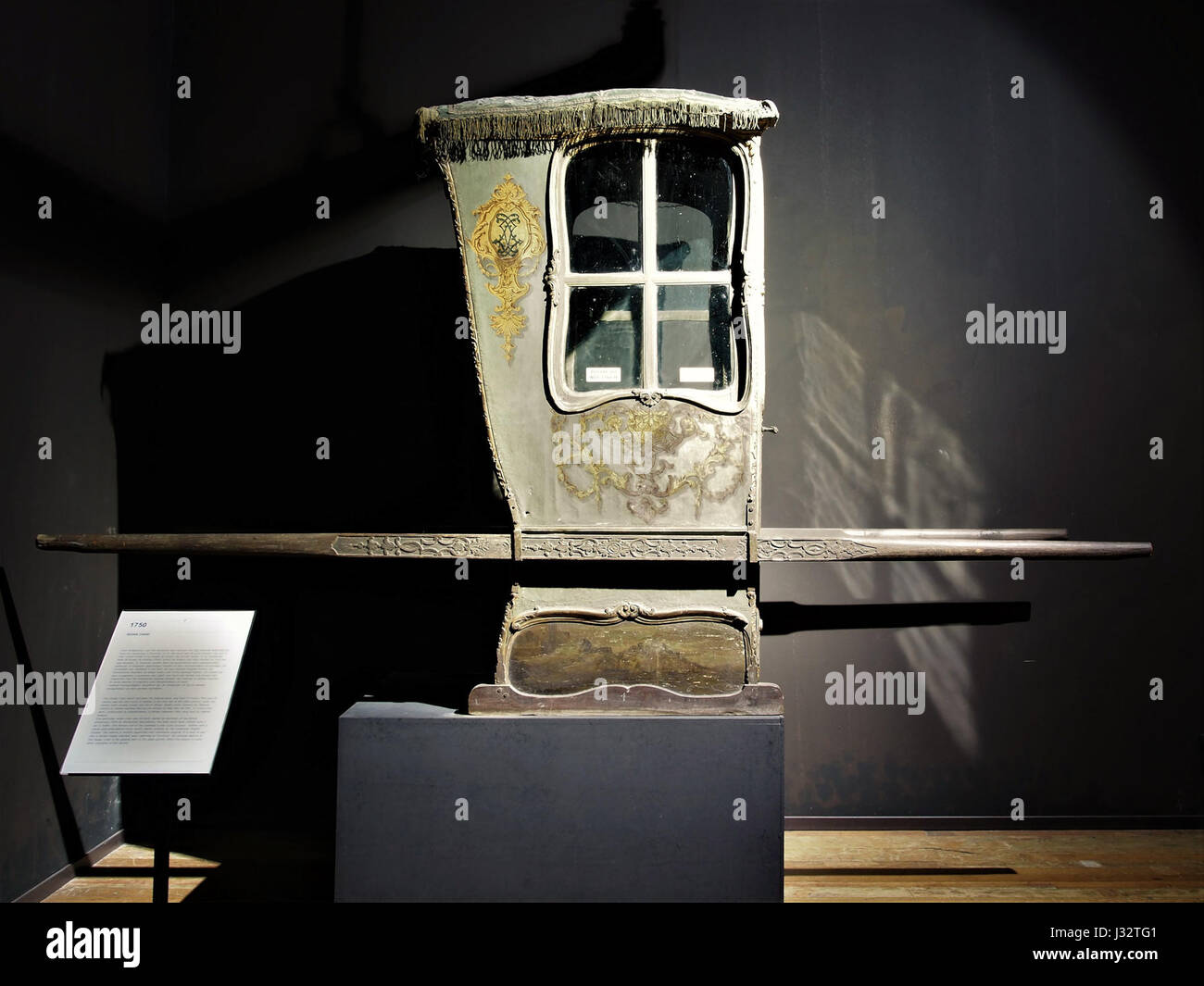 This photo from 1750 captures a sedan chair, a common form of ...