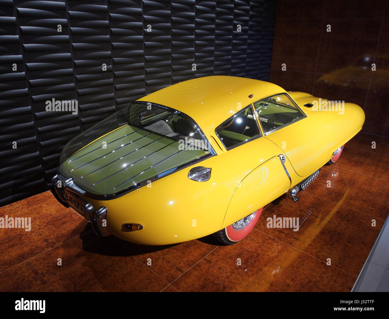 This image features a 1952 Pegaso Z-102, a classic Spanish sports car ...
