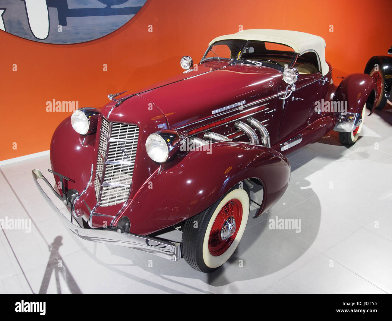 This photograph features the 1936 Auburn Model 852 Speedster, a classic ...