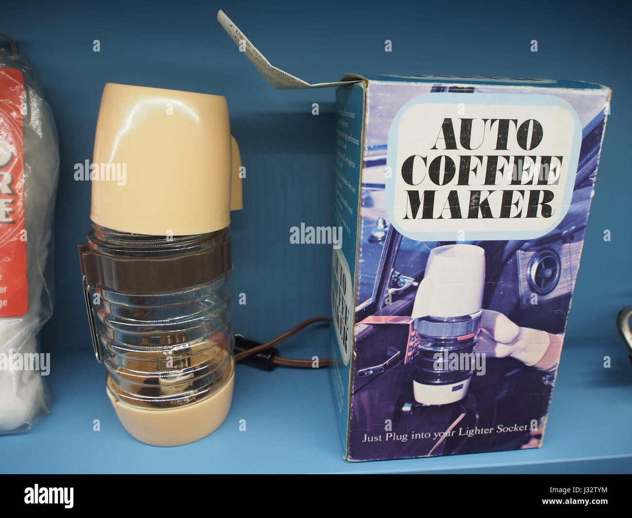 The image shows an *Auto Coffee Maker*, a modern appliance designed for ...