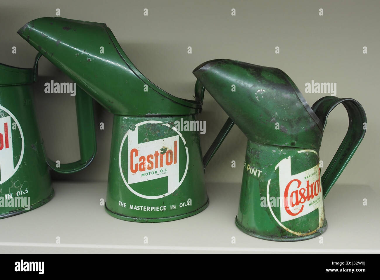 This image shows a series of Castrol oil cans, often associated with ...
