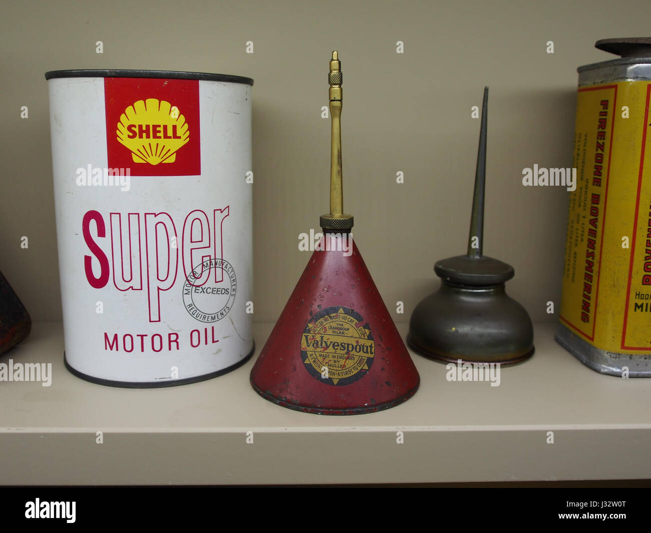 The advertisement for Shell Super motor oil highlights its essential ...