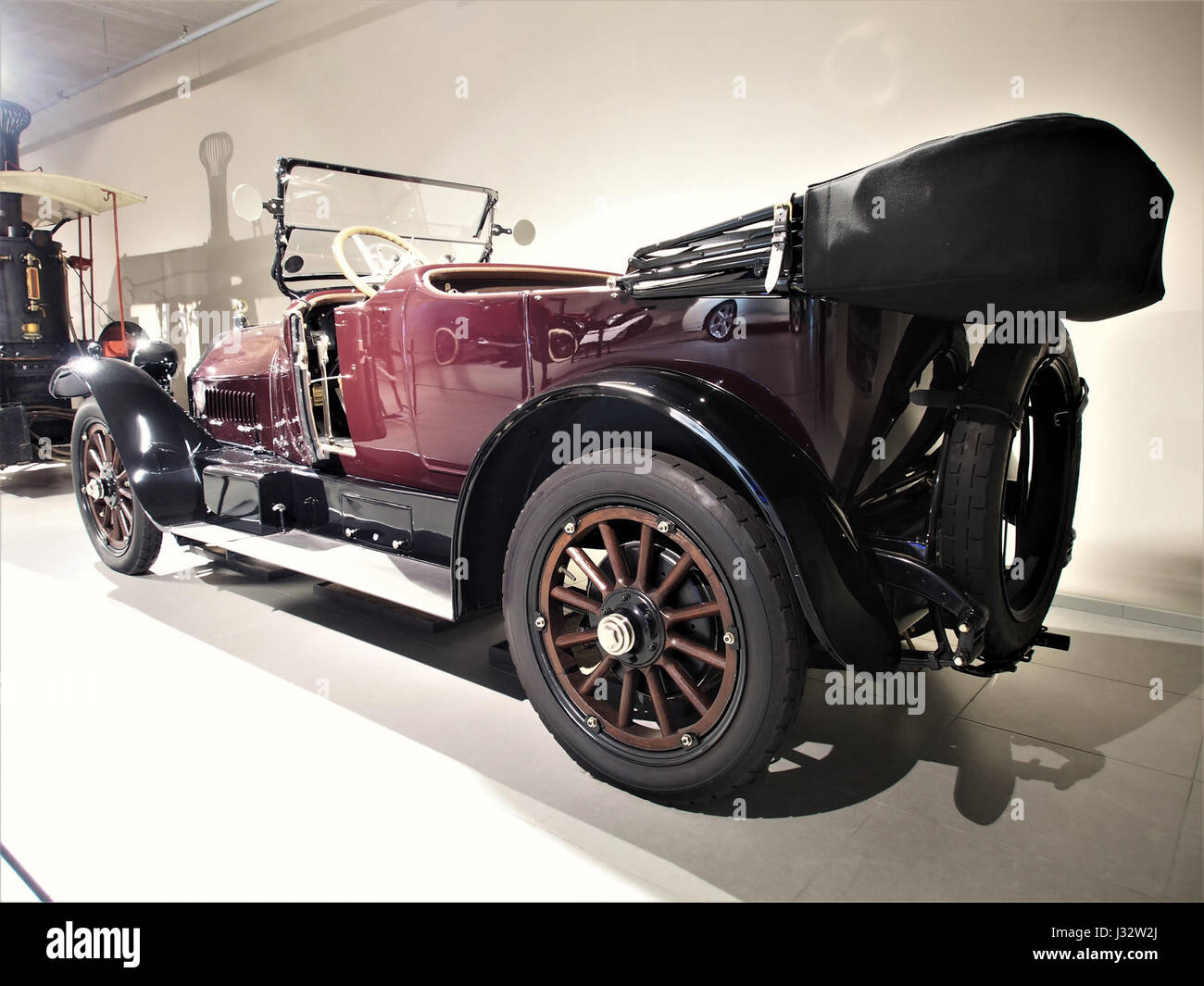 This photograph features a 1916 Owen Magnetic M 25-4, an early 20th ...