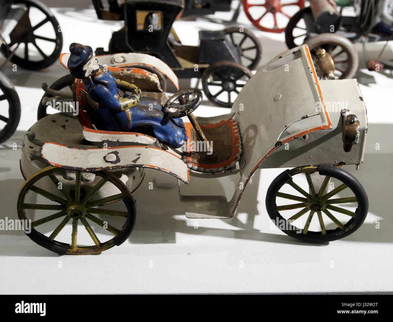 A vintage tin toy car displayed at the Louwman Museum in the ...