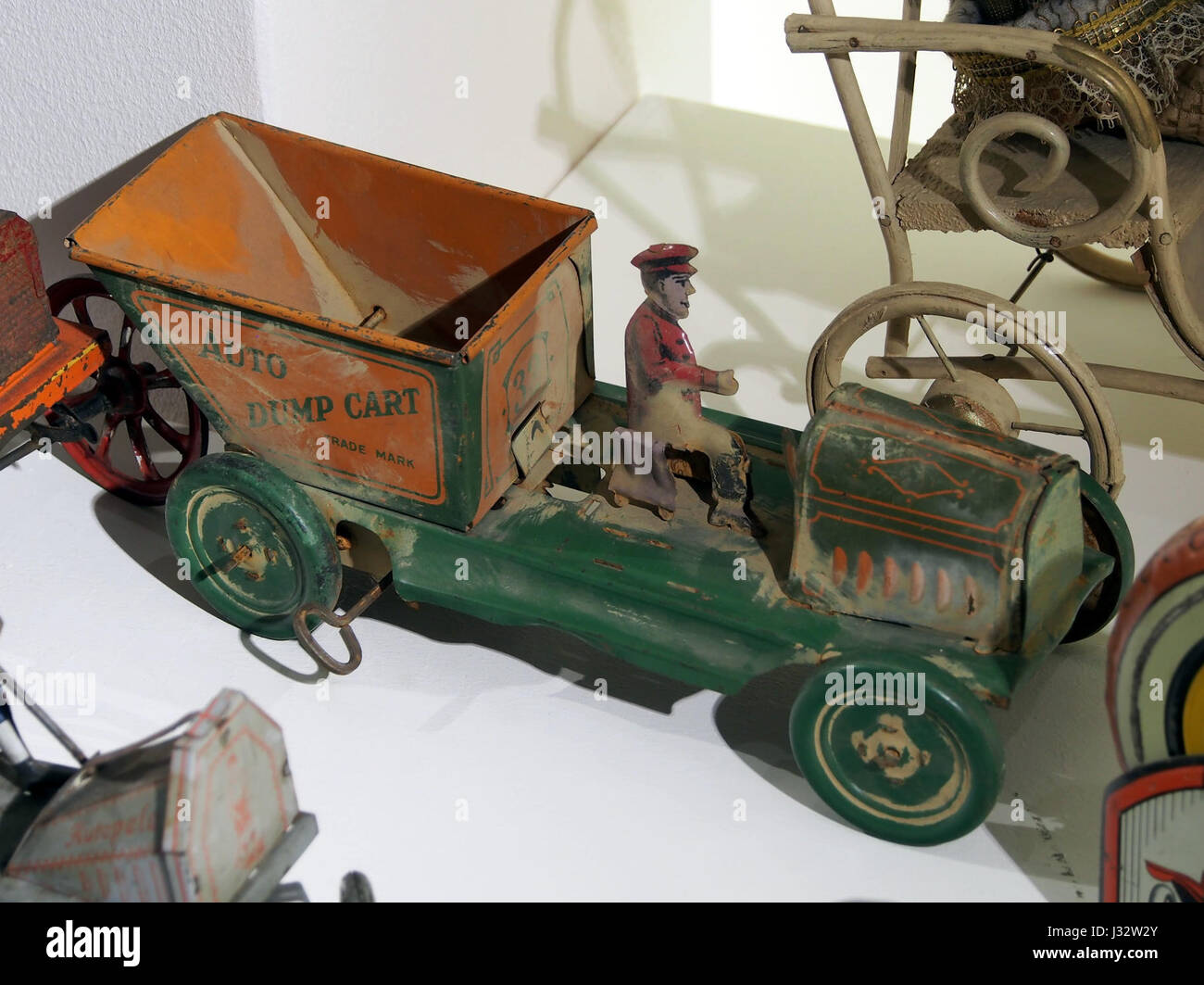 The image shows a tin toy car displayed at the Louwman Museum in the ...