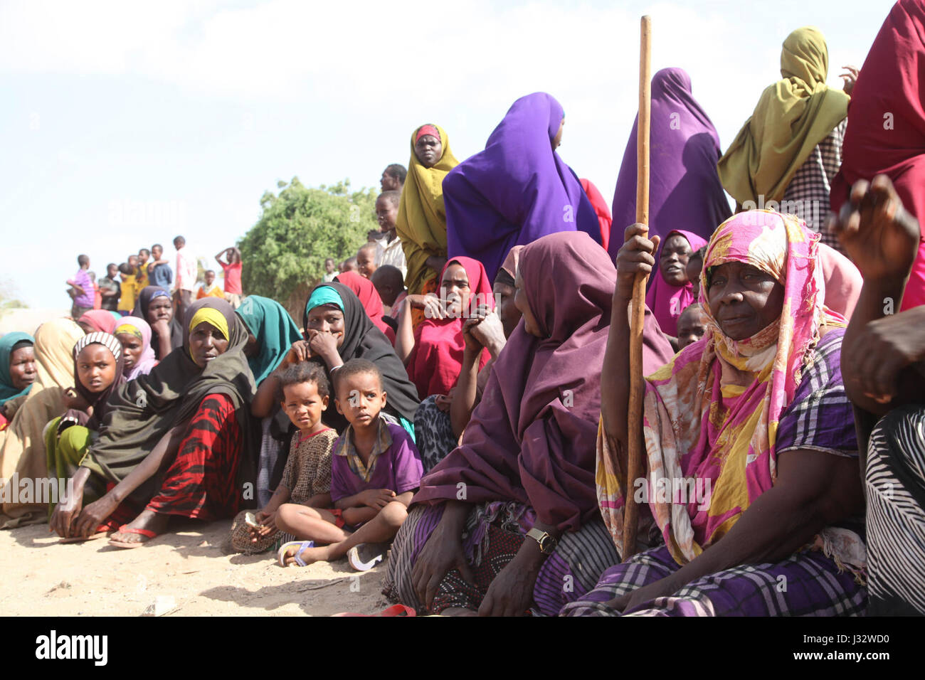 On January 15, 2017, residents of Goobweyn in Somalia waited to receive ...