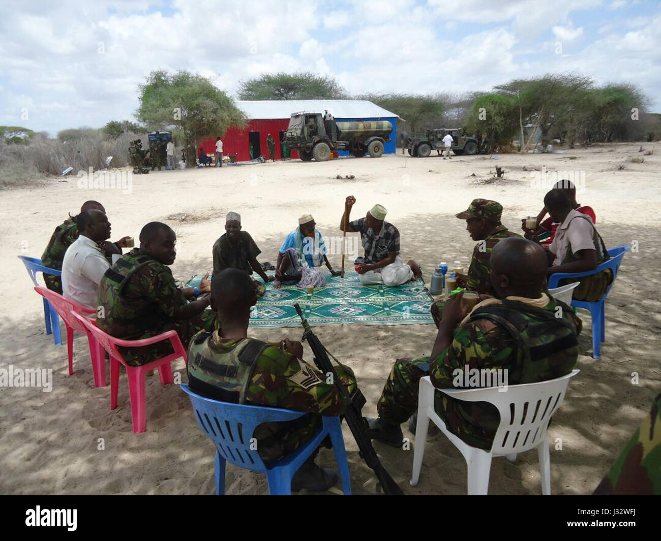 AMISOM KDF officers hold a meeting with the Traditional elders during a ...