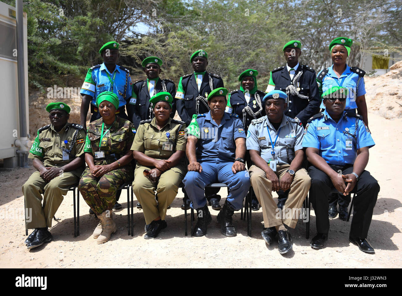 Group of senior officers with a map hi-res stock photography and images ...
