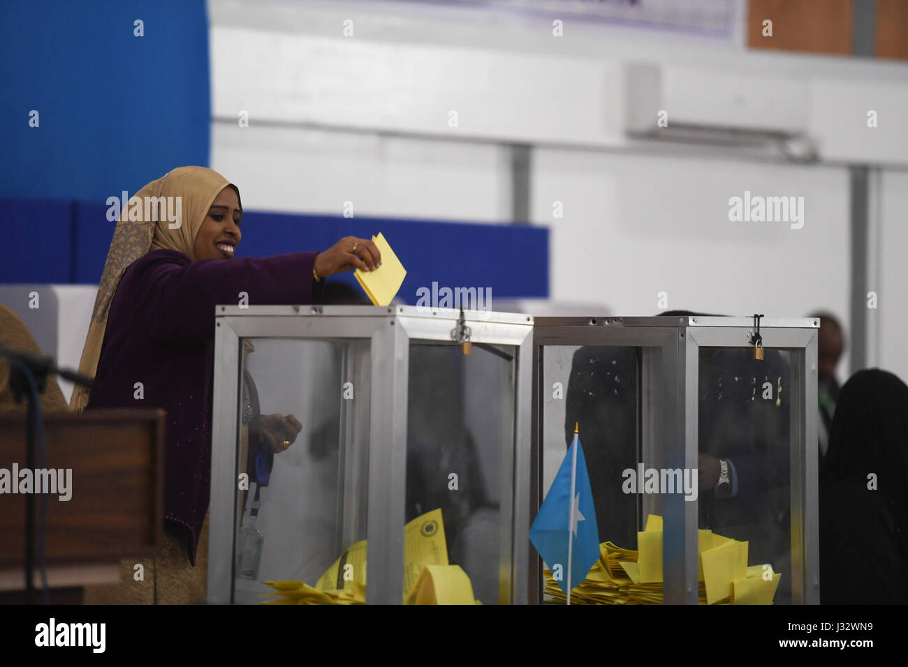 A Member of Parliament casts her vote during Presidential elections ...