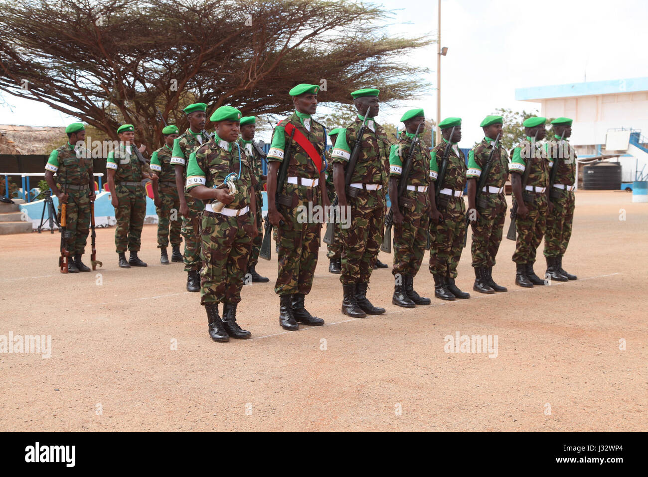 AMISOM troops perform a guard of honour during a high-level visit by ...