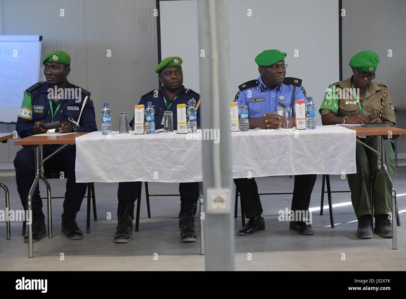 AMISOM officials oversee the closing ceremony of induction training for ...