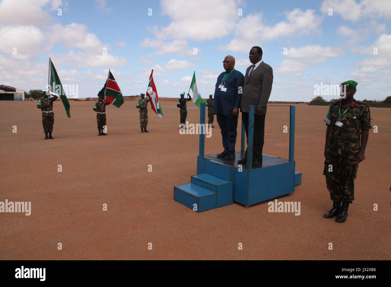 Ambassadors Ndumiso Ntshinga and Francisco Madeira are greeted by ...
