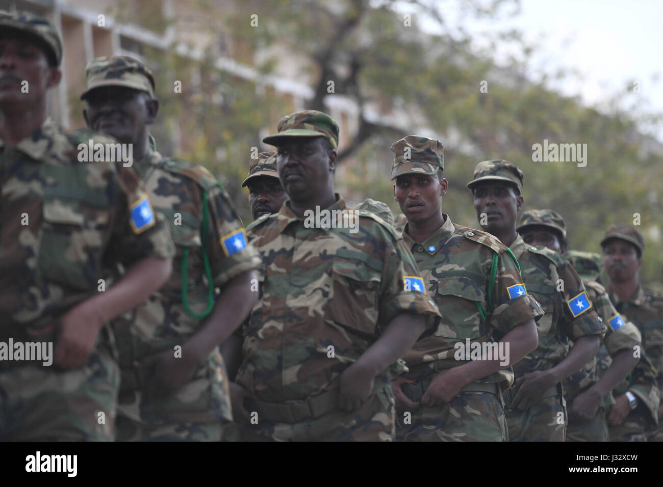 Somali National Army soldiers participate in the 57th Anniversary ...