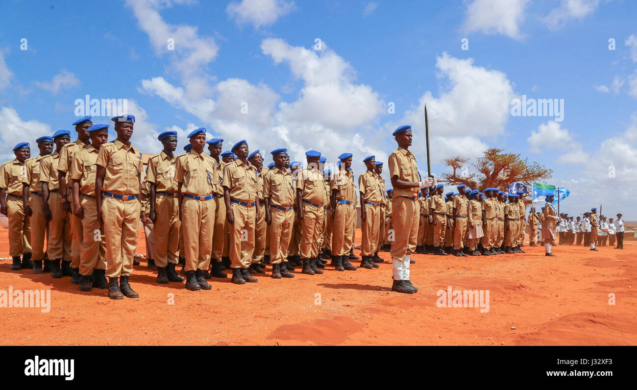Newly trained Somali Police officers take part in a passing out parade ...