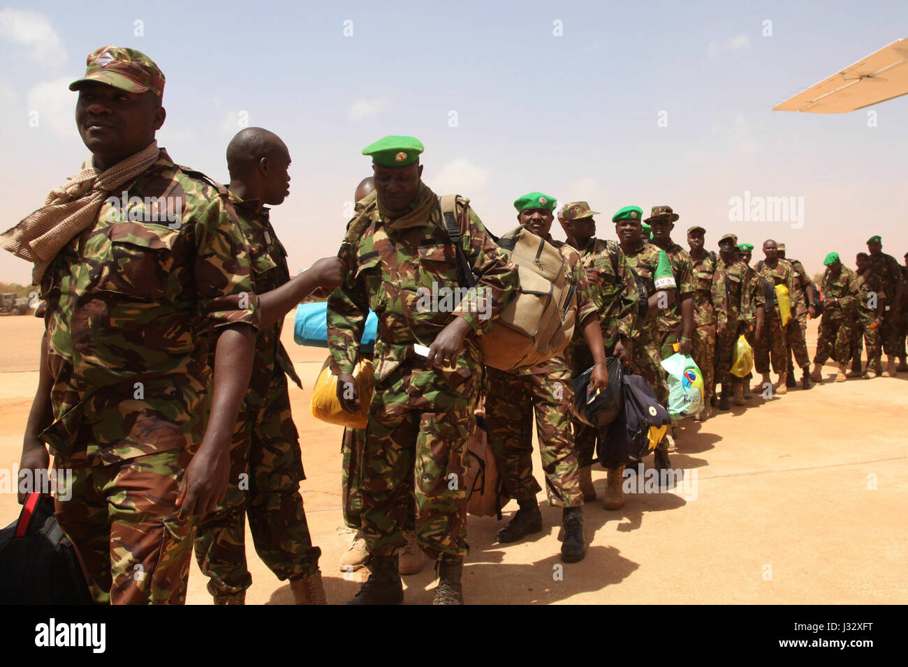 This image captures Kenyan Defence Forces (KDF) soldiers completing their rotation after serving ...