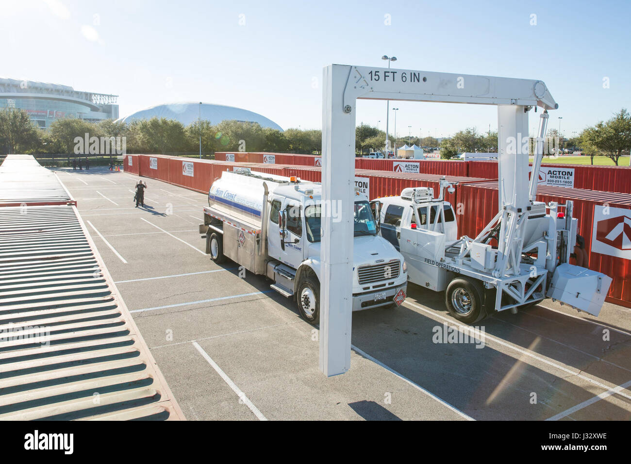 U.S. Customs and Border Protection officers inspect commercial trucks ...