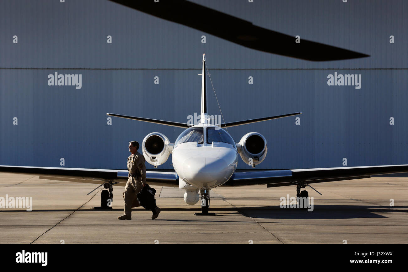 An air interdiction agent with U.S. Customs and Border Protection ...