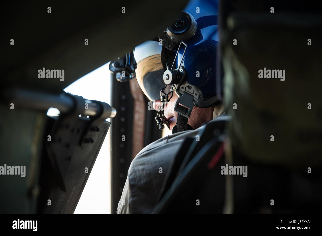 A crew member of a Black Hawk helicopter operated by U.S. Customs and ...
