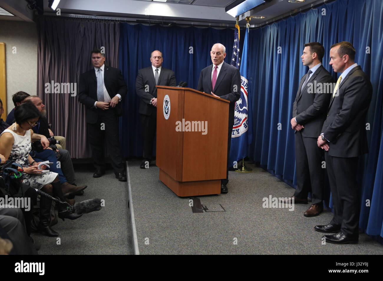 This image captures U.S. Secretary of Homeland Security John Kelly ...