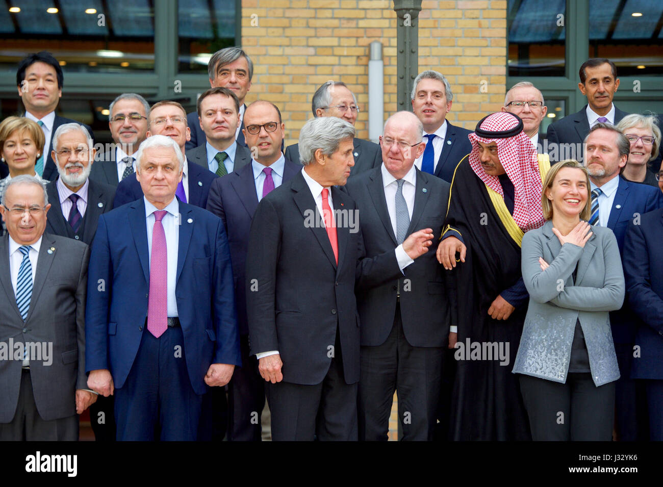 The photo captures U.S. Secretary of State John Kerry with Kuwaiti ...